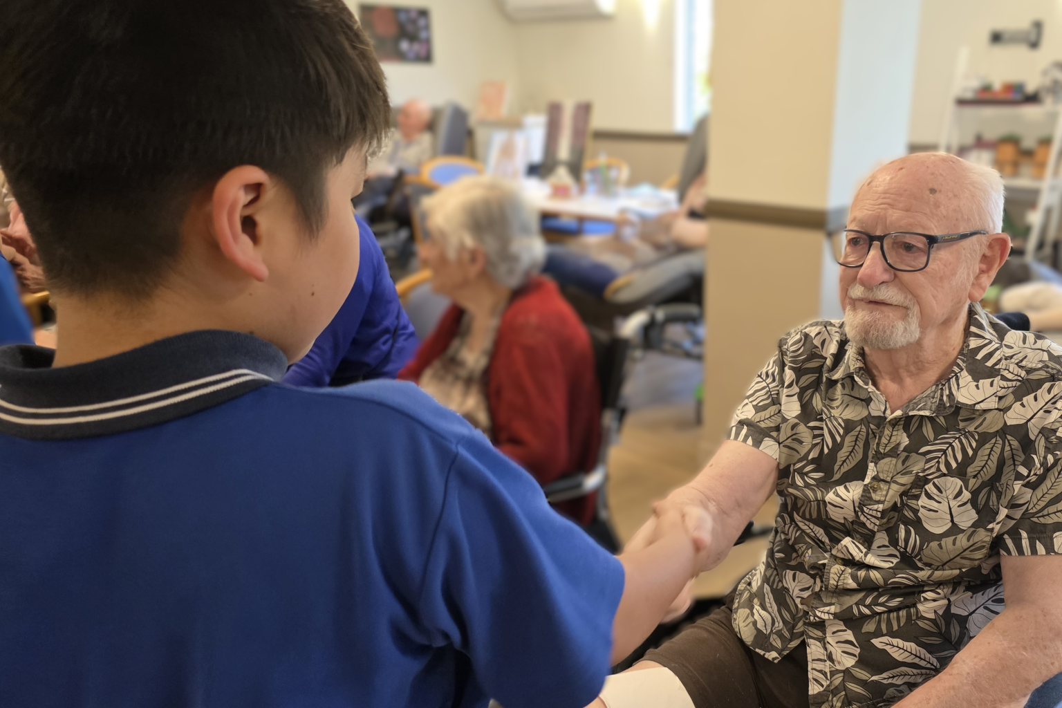 Intergenerational joy at Regis Holland Park – Regis Aged Care