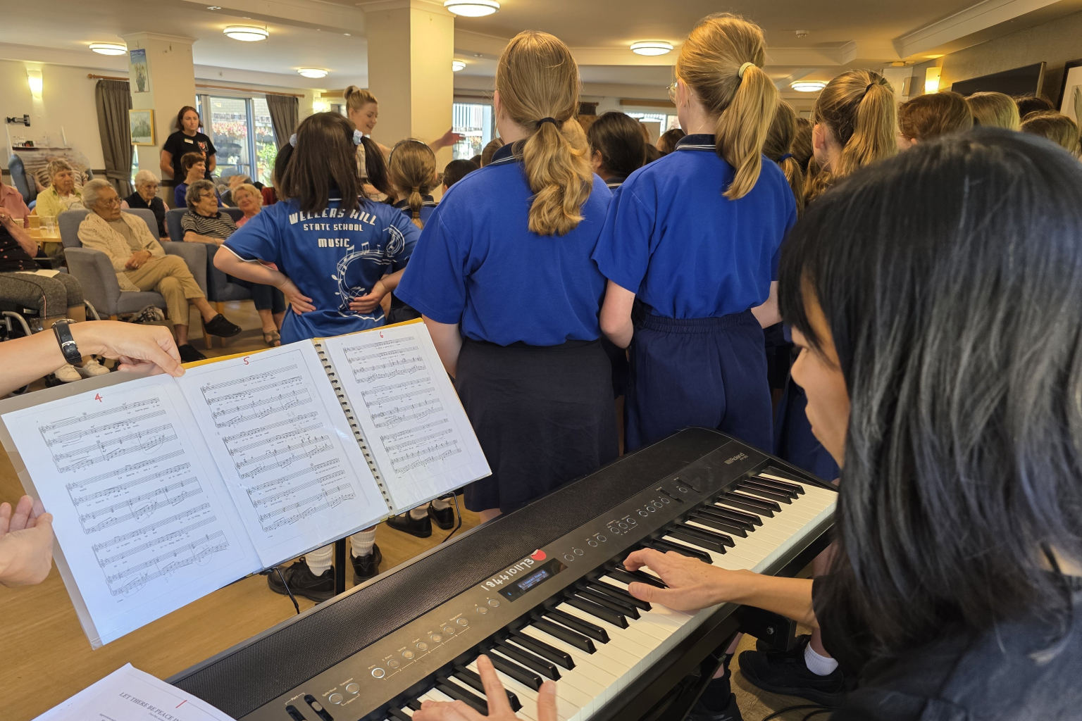 Intergenerational joy at Regis Holland Park – Regis Aged Care