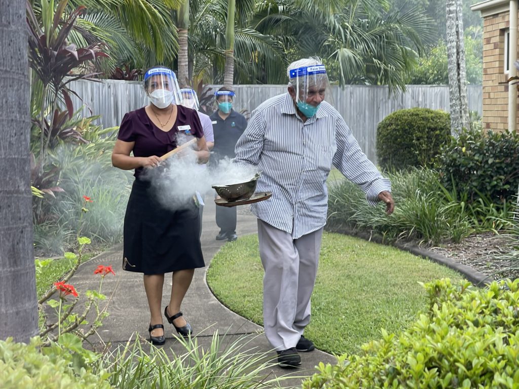 Smoking Ceremony at Regis Greenbank | Regis Aged Care